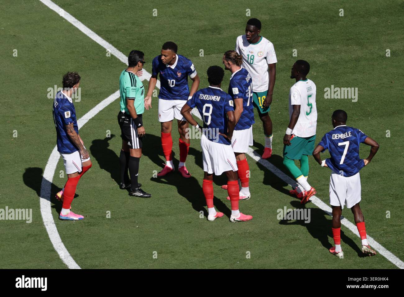 French players argue with referee Alireza Faghani during the World Cup ...