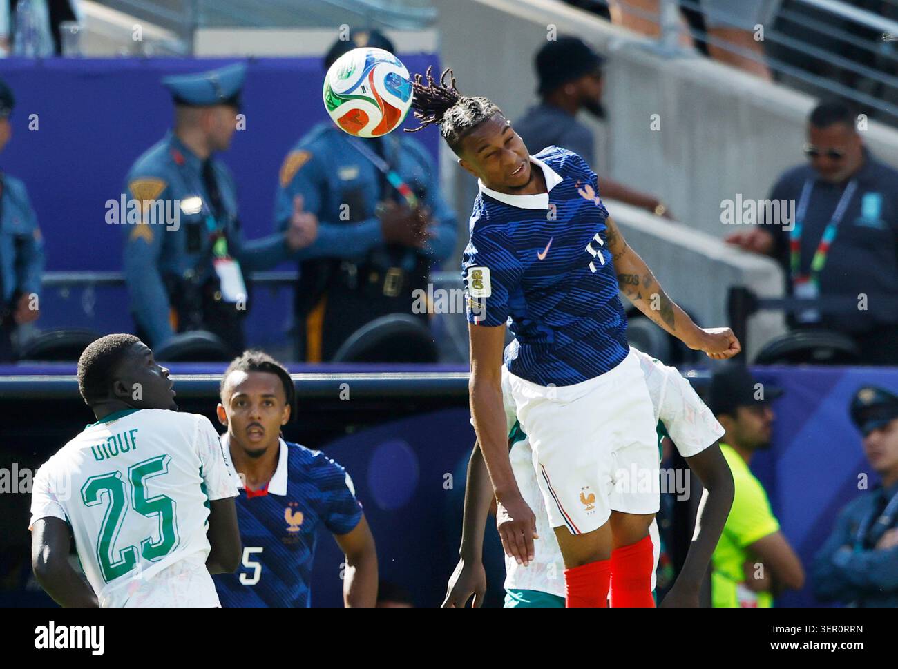 Michael Olise of France heads the ball against Senegal in the second ...