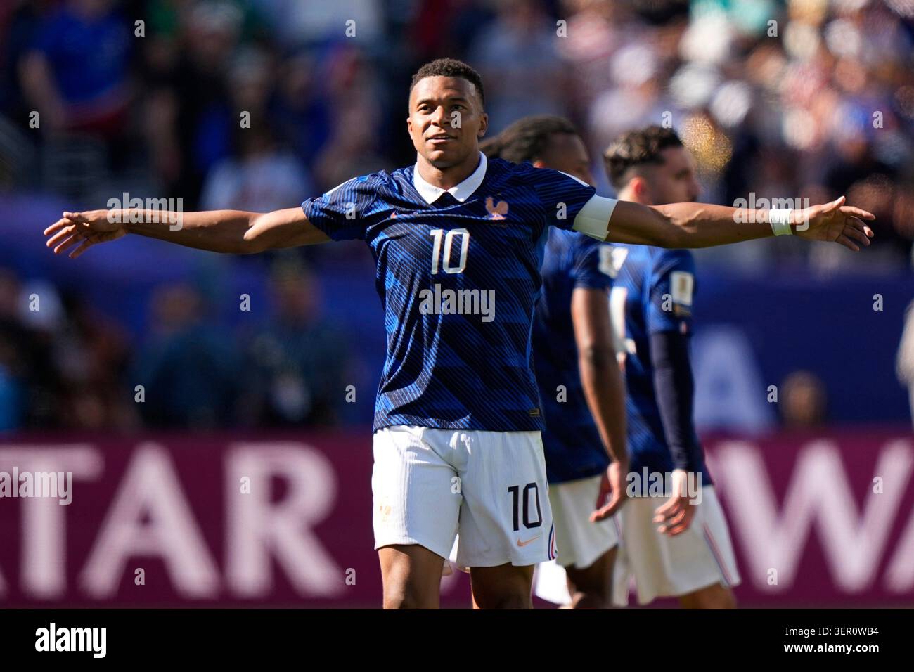 France's Kylian Mbappe celebrates after scoring his side's third goal ...