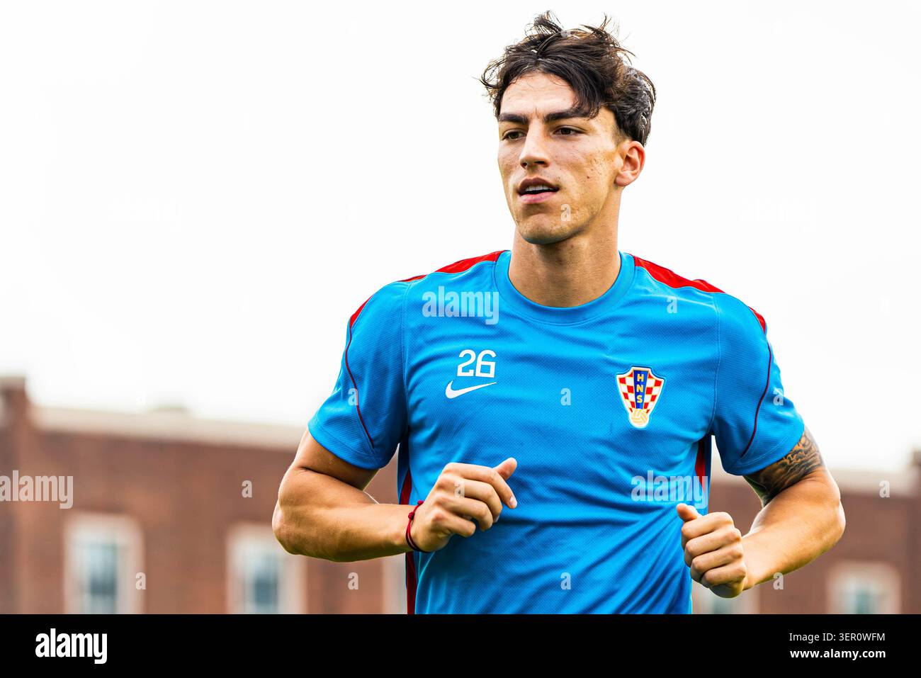 Croatia forward Petar Musa (26) jogs over to the media at Southern ...
