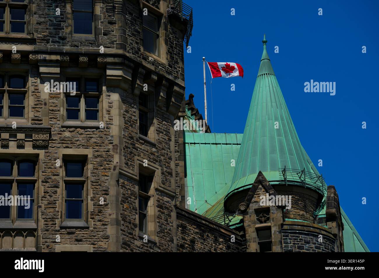 The flag files on top of the Confederation Building on Parliament Hill ...