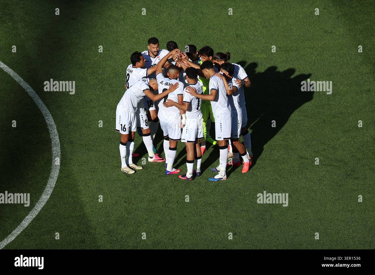 Iraq huddles during the World Cup Group I soccer match between Iraq and ...