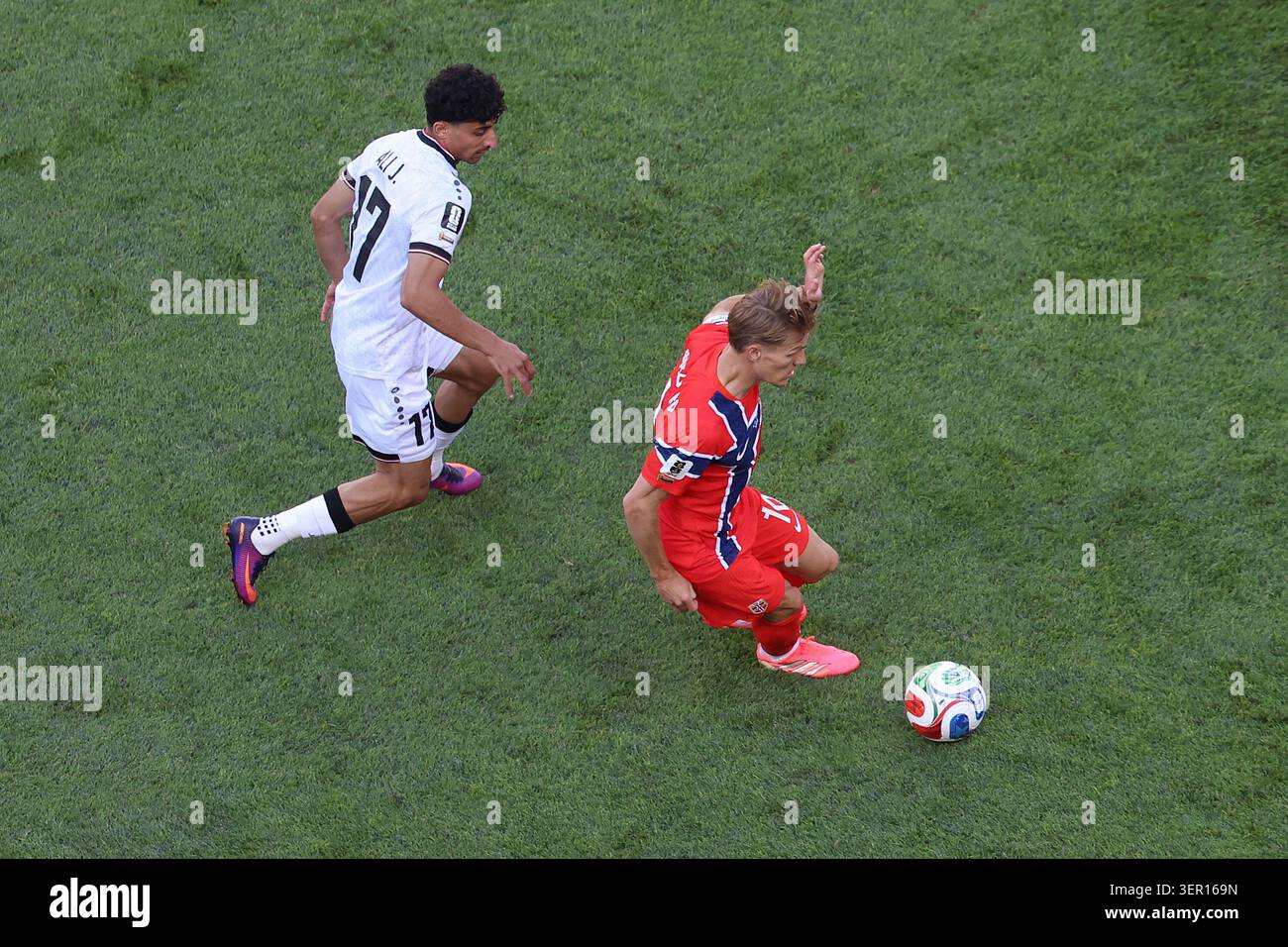 Norway's Martin Oedegaard (10) moves the ball against Iran's Arya ...