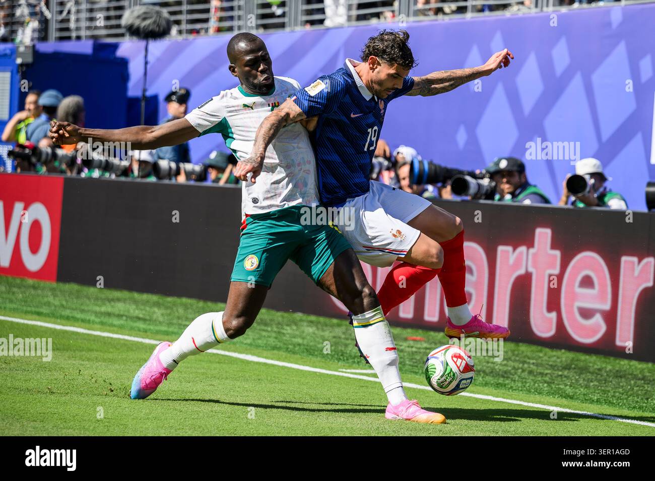 Theo Hernandez of France competes for the ball with Kalidou Koulibaly ...