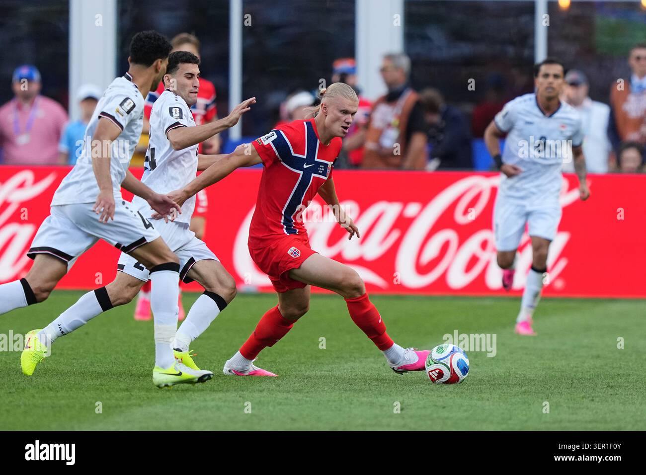 Norway's Erling Haaland, center, dribbles the ball during the World Cup ...