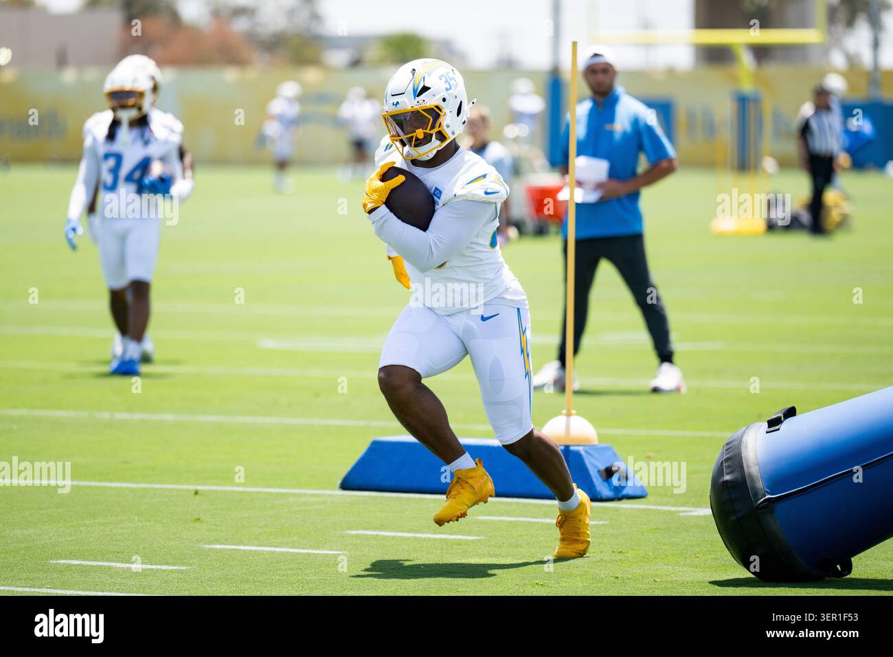 Los Angeles Chargers running back Amar Johnson runs with the ball ...