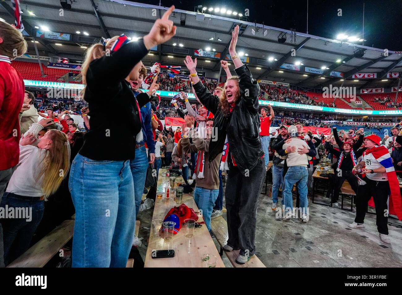 Oslo 20260617. People cheer after Erling Braut Haaland's 1-2 goal at a ...
