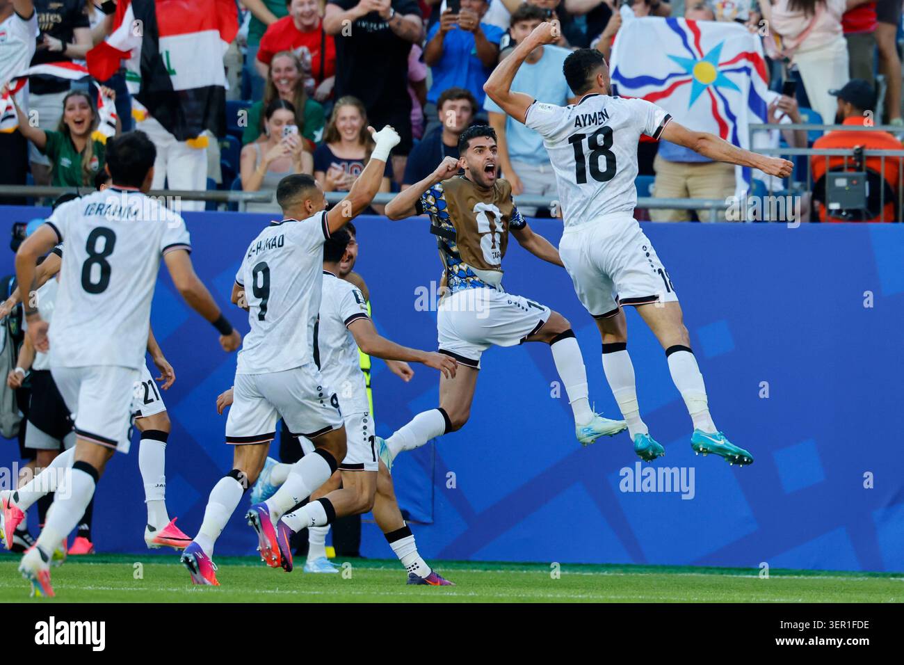 Iraq forward Ayman Hussein right celebrates his goal against Norway ...