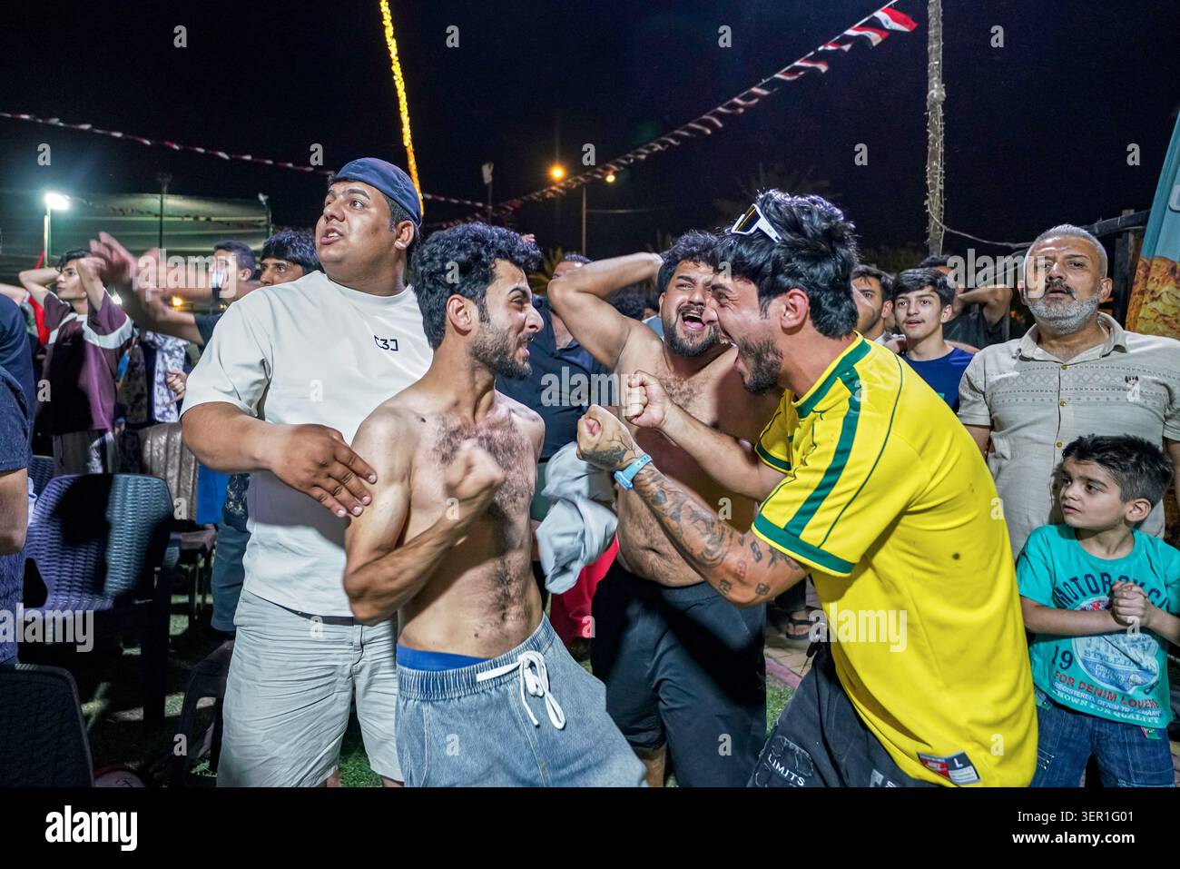 Iraqi soccer fans react after Iraq scored as they watch the World Cup ...