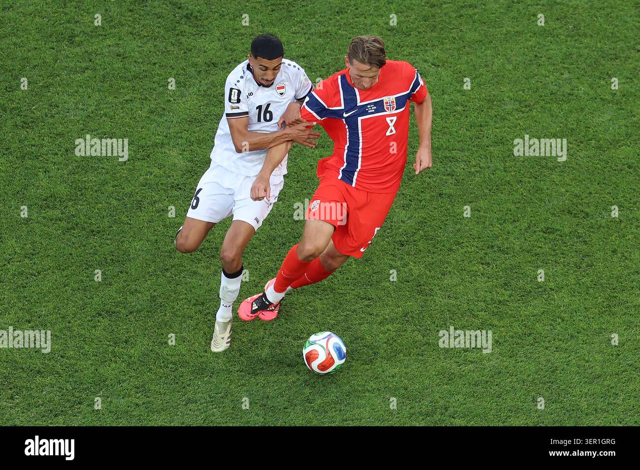 Iraq's Amir Alammari (16) and Norway's Sander Berge (8) battle for the ...
