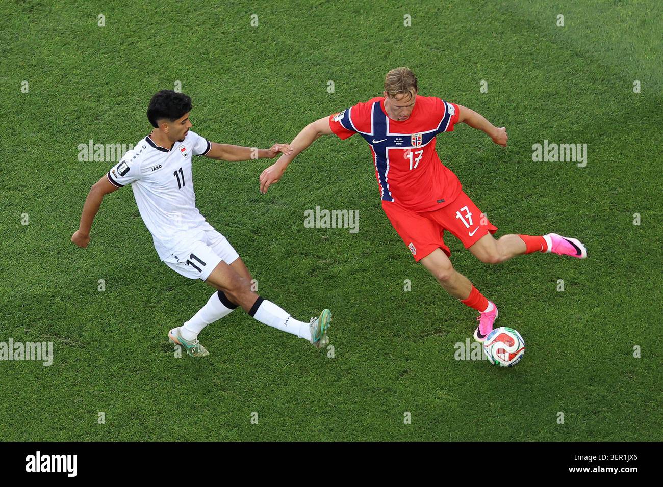 Norway's Torbjoern Heggem (17) plays the ball aaginst Iraq's Ahmed ...