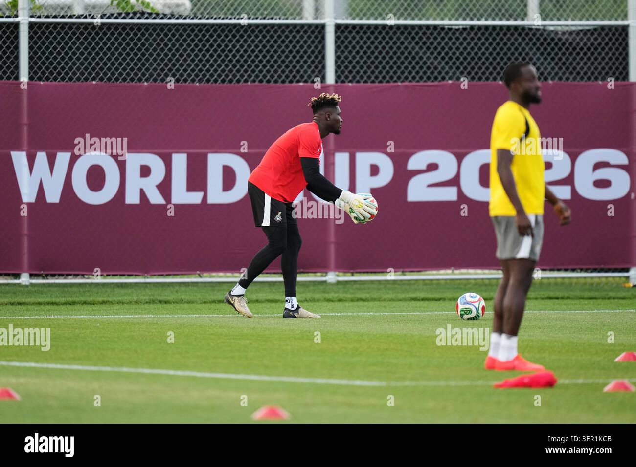 Ghana goalkeeper Joseph Anang, left, works out during a training ...