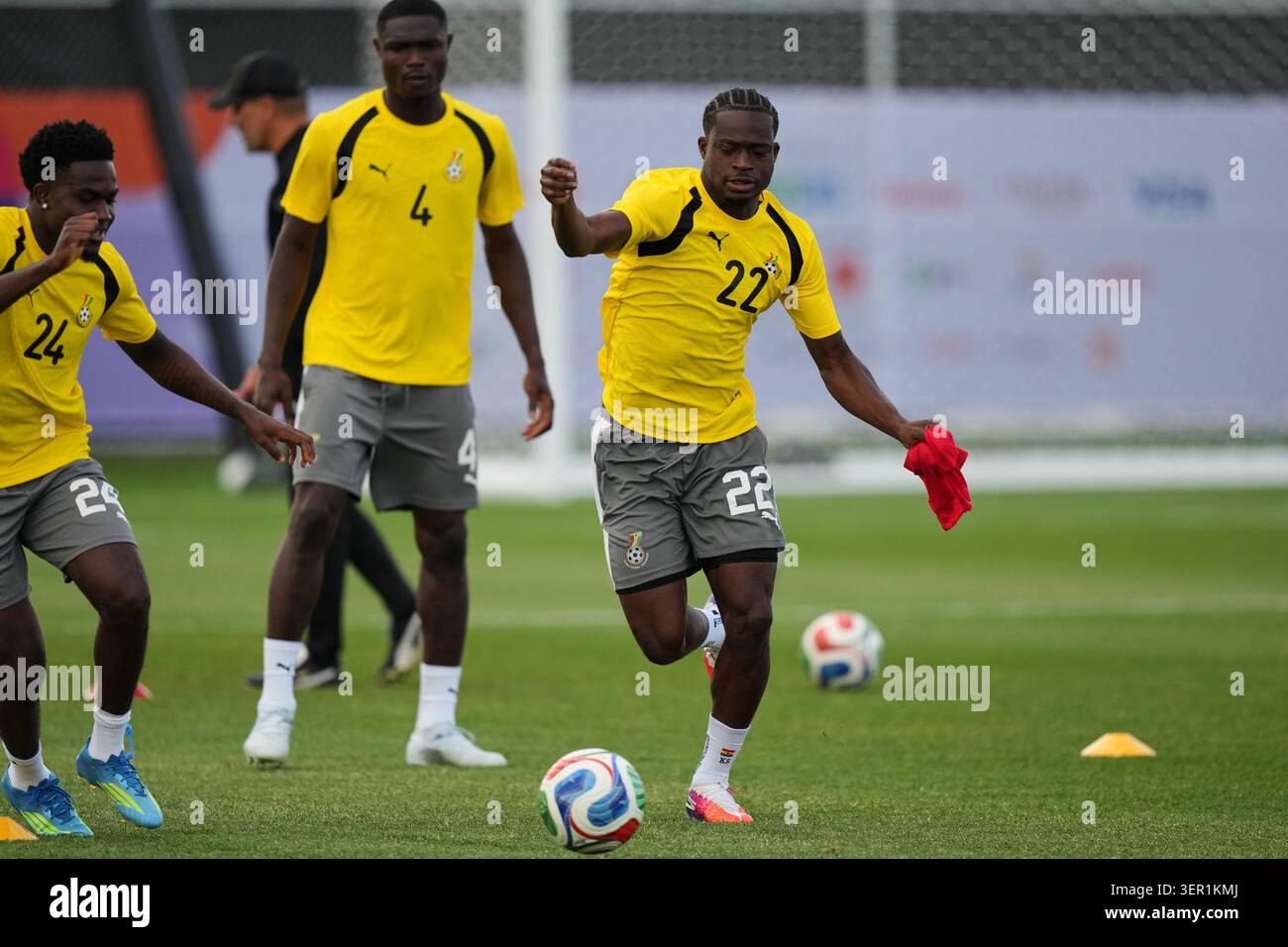 Ghana's Kamaldeen Sulemana, right, works out with teammates during a ...