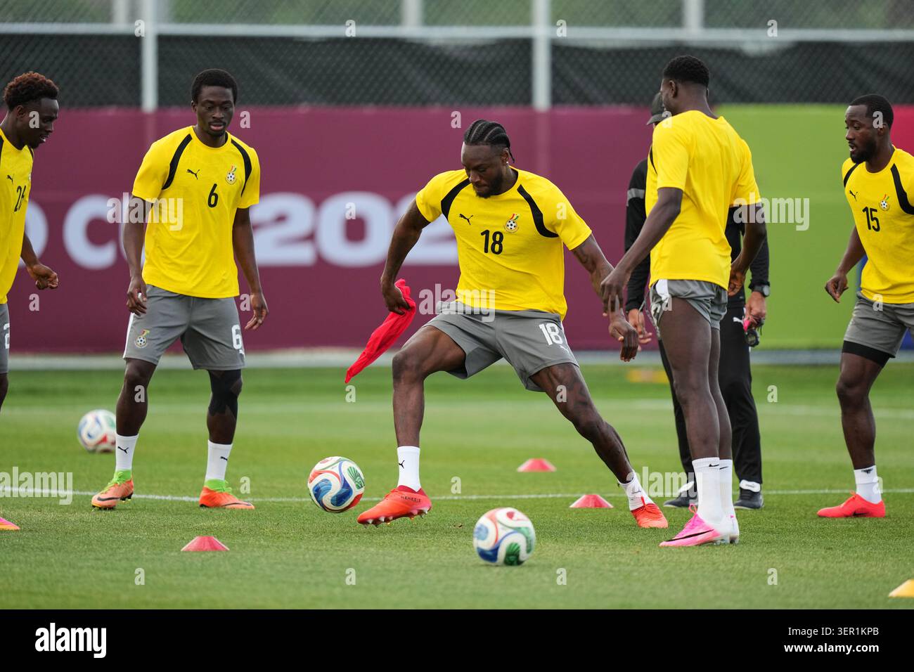 Ghana's Jerome Opoku, center, works out with teammates during a ...