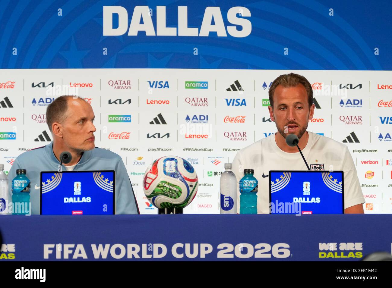 England's Harry Kane, right, speaks as head coach Thomas Tuchel listens ...