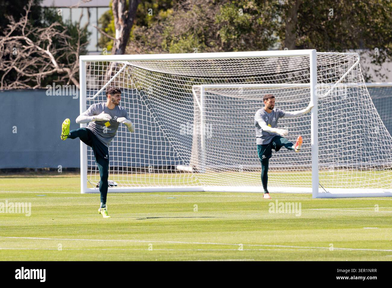 Socceroos player Patrick Beach, left, and Paul Izzo, right, seen during ...