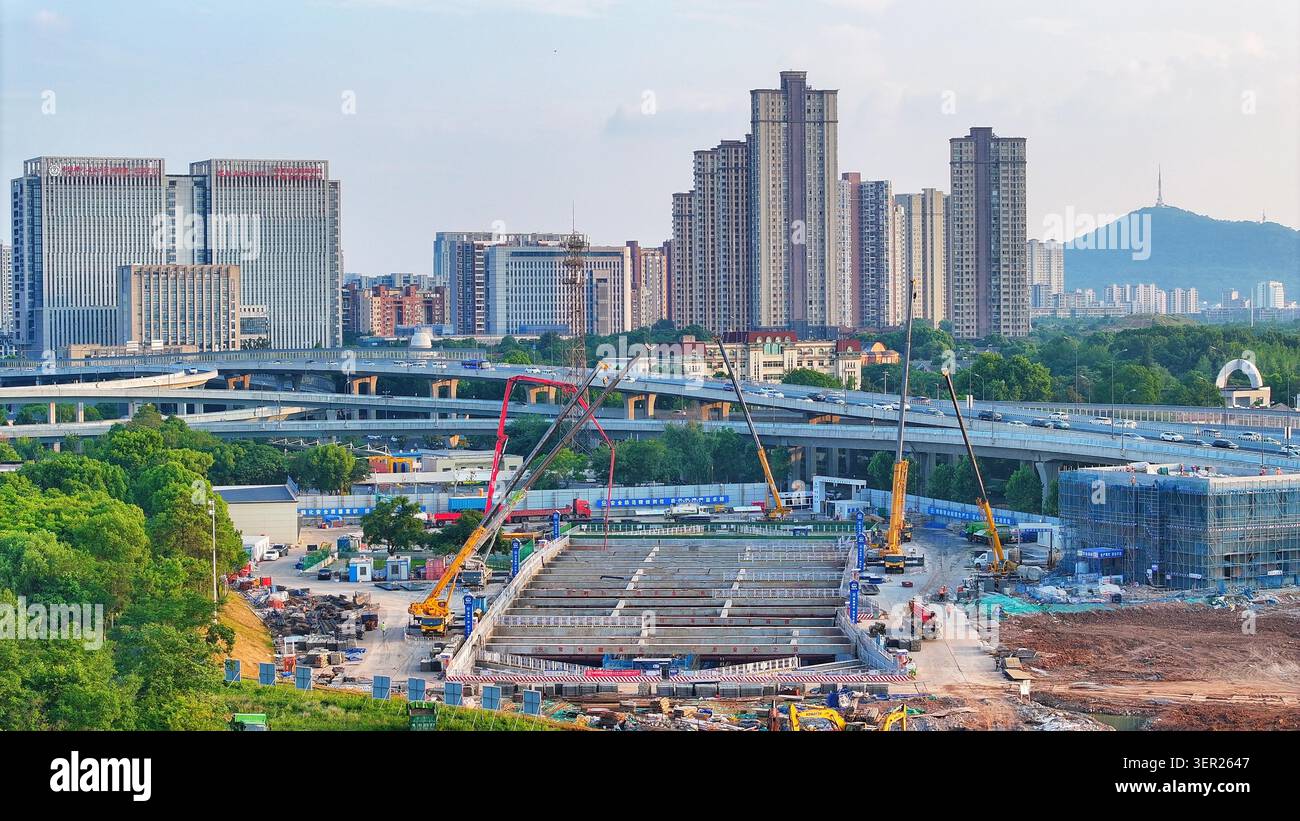Workers construct the Dongpu Reservoir underpass project in Hefei, east ...