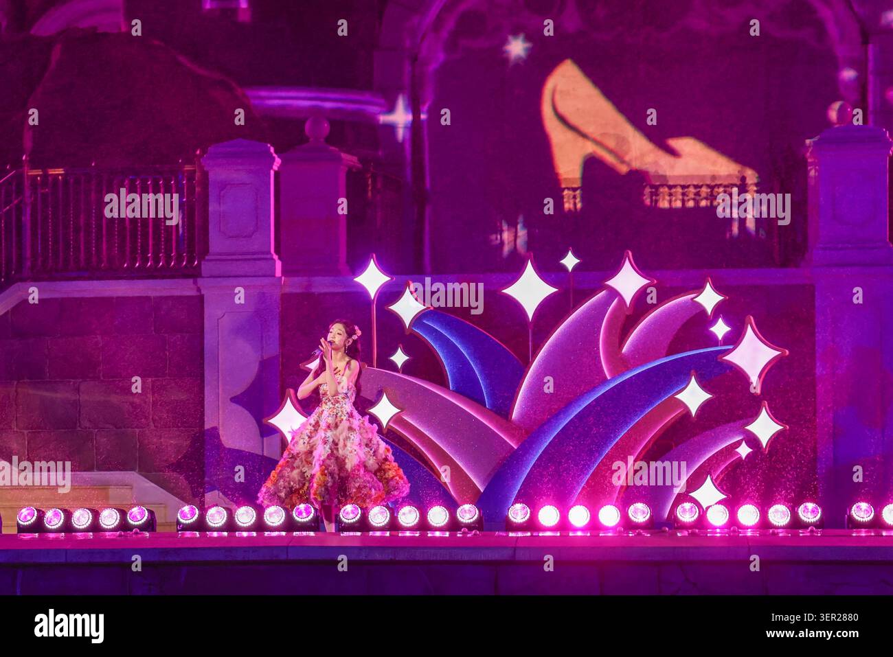 Chinese singer Xilinayi Gao performs during the 10th anniversary ...