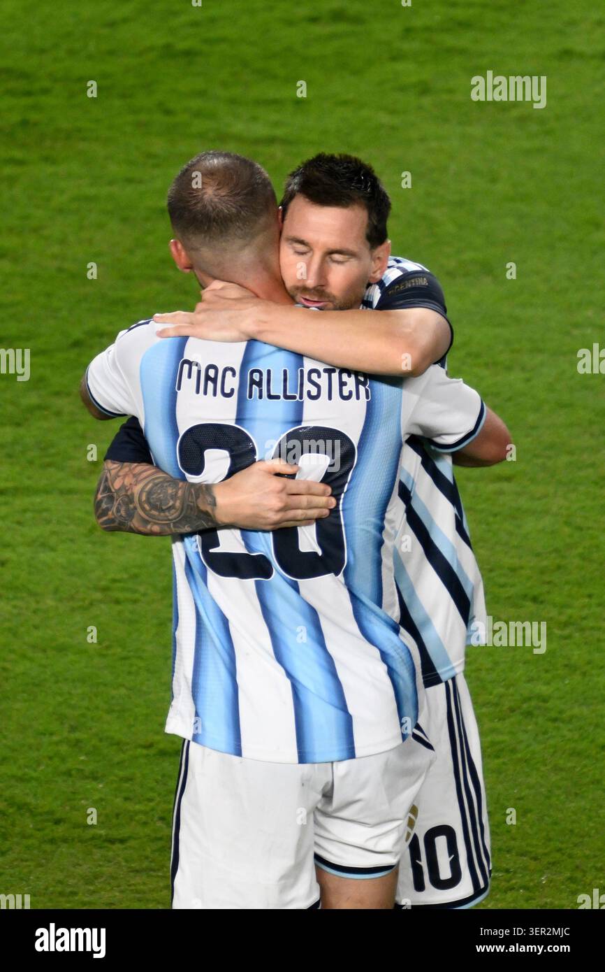 Argentina's Lionel Messi (10) embraces Argentina's Alexis Mac Allister ...