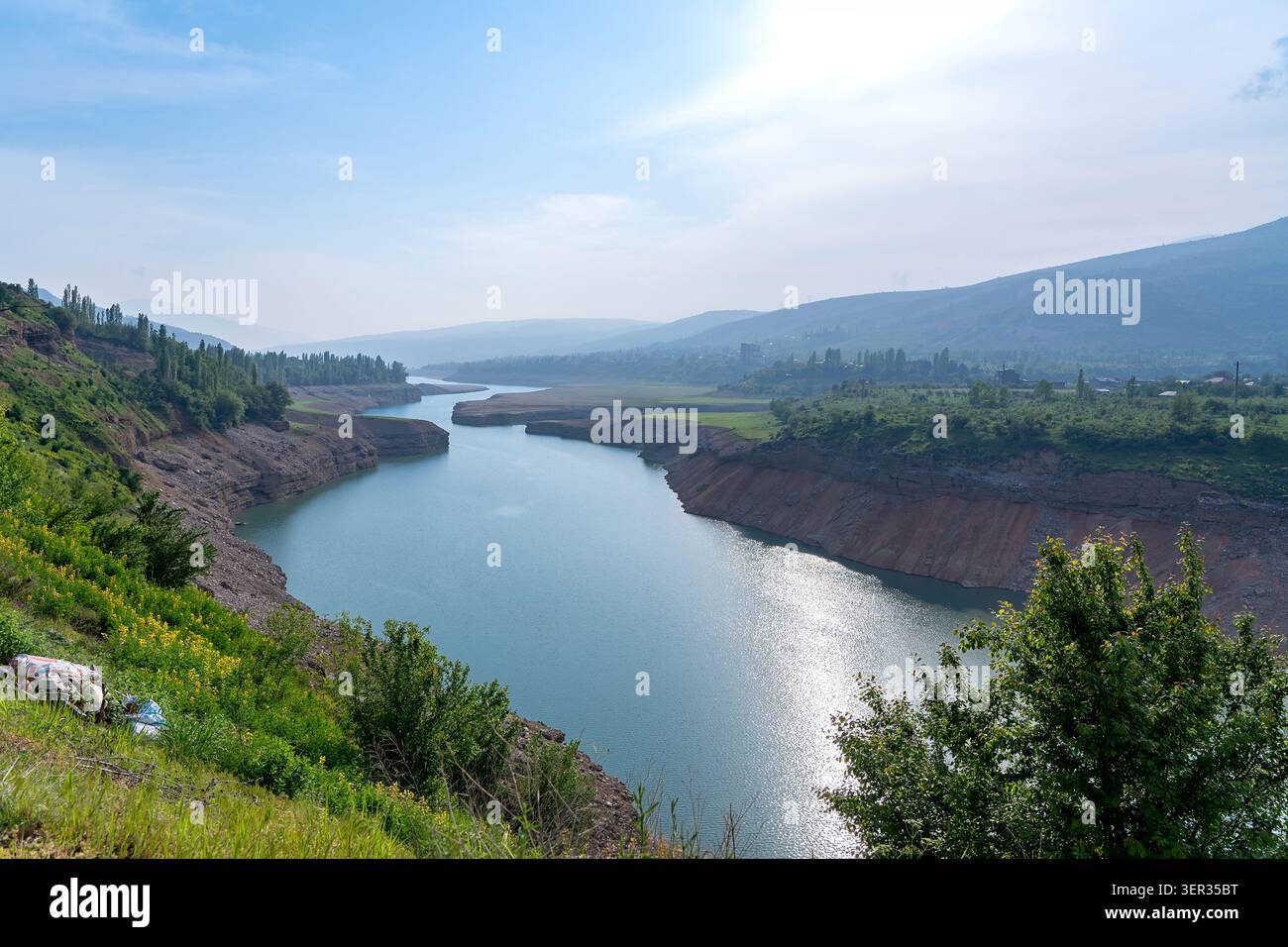 River flowing into Charvak reservoir in Uzbekistan. Mountainous ...