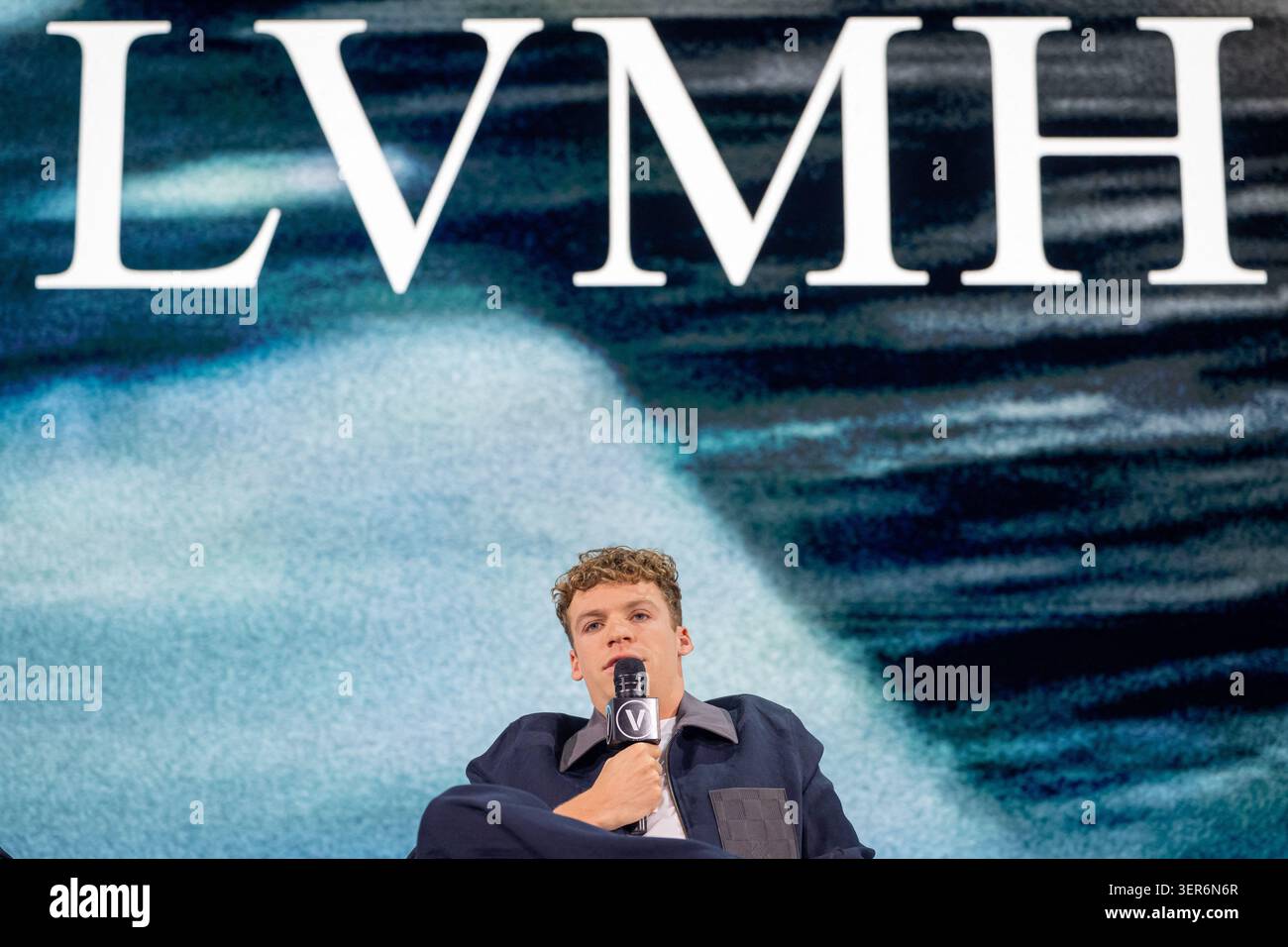 French swimmer Leon Marchand with LVMH Logo on stage at the VivaTech ...