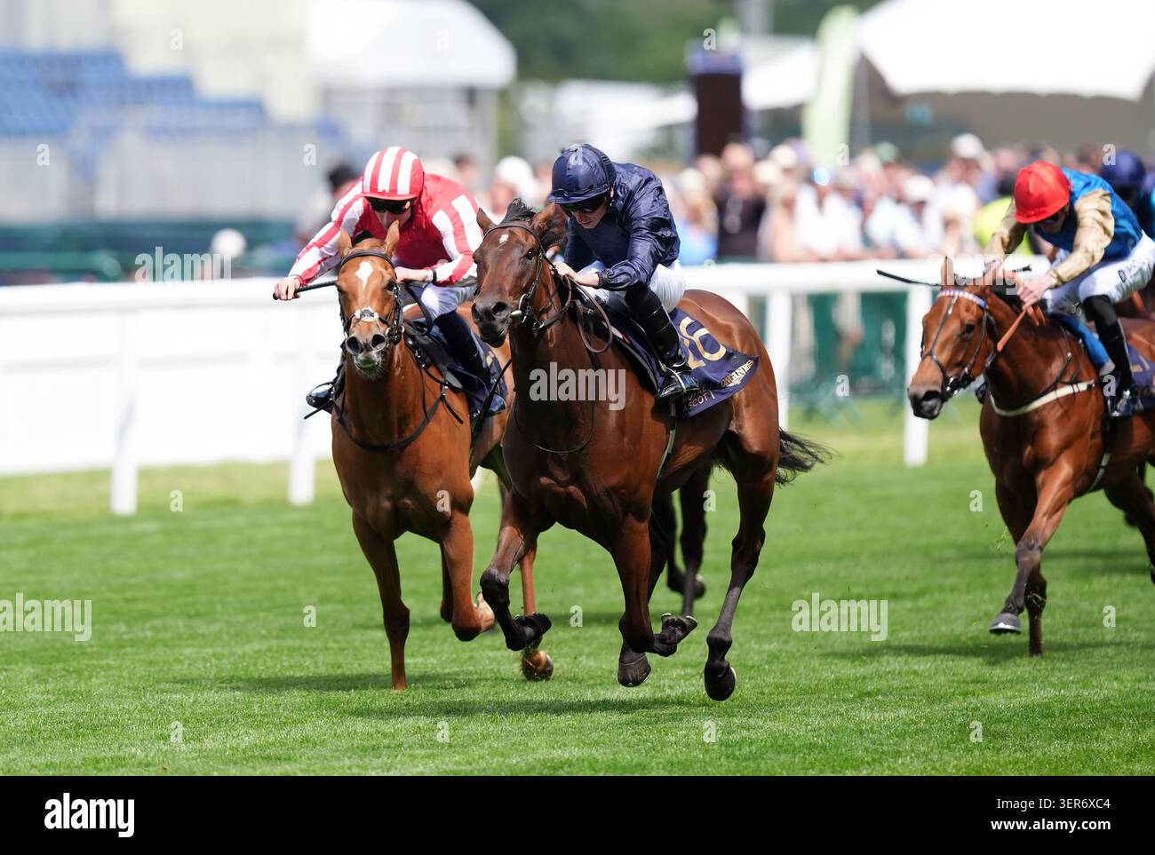 Victorious ridden by Ryan Moore (second left) on their way to winning ...