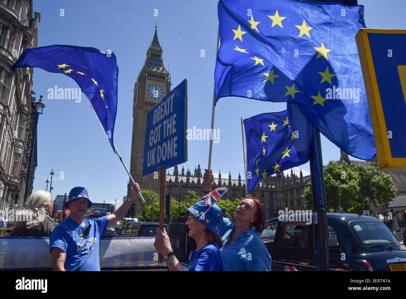 London, UK. 17th June 2026. Activists hold European Union flags during ...