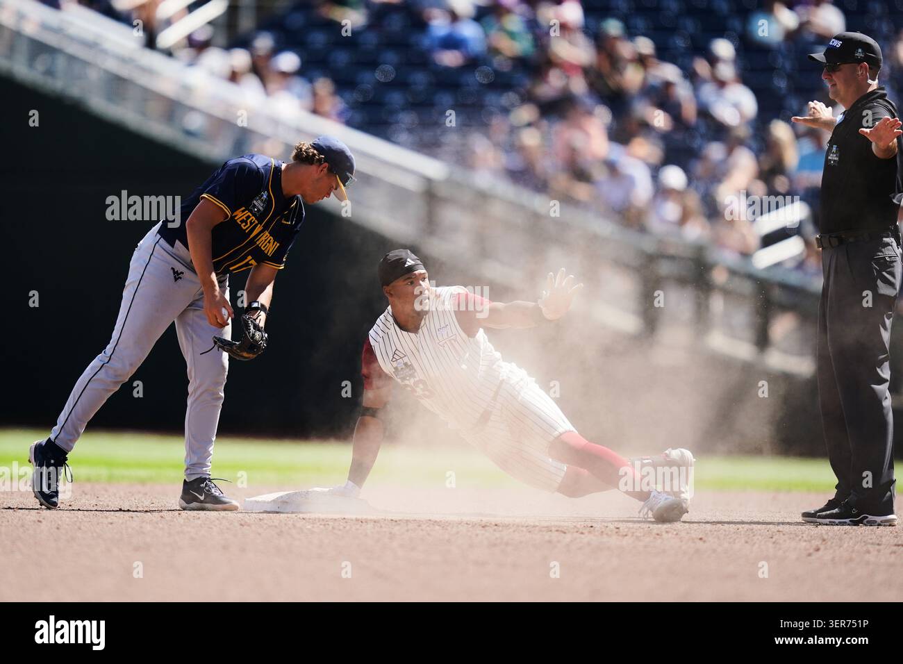 Troy outfielder Houston Markham (23) slides safely into second during ...