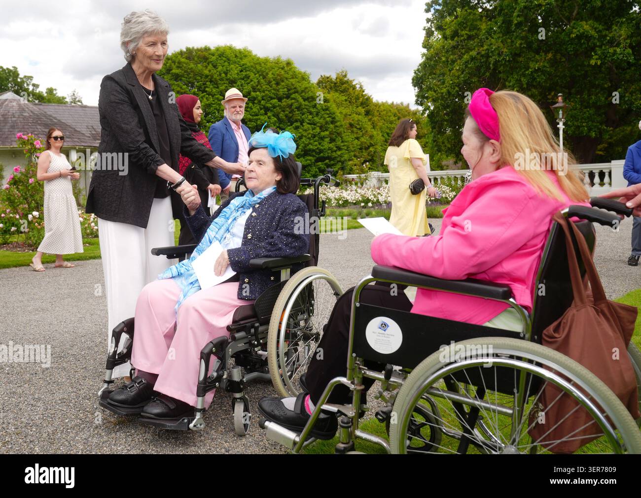President Catherine Connolly with guests while hosting her first ...