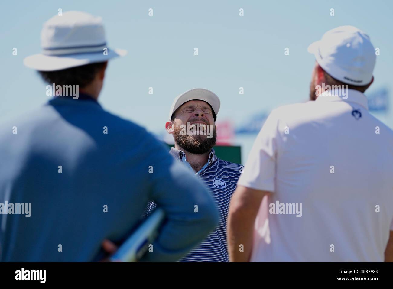 Tyrrell Hatton, of England, and Shane Lowry talk on the first tee ...