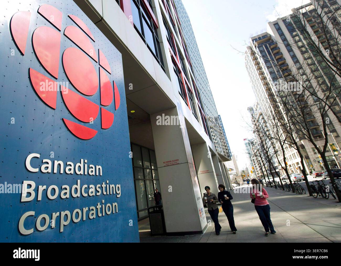 People walk near the CBC building in Toronto on April 4, 2012.THE ...