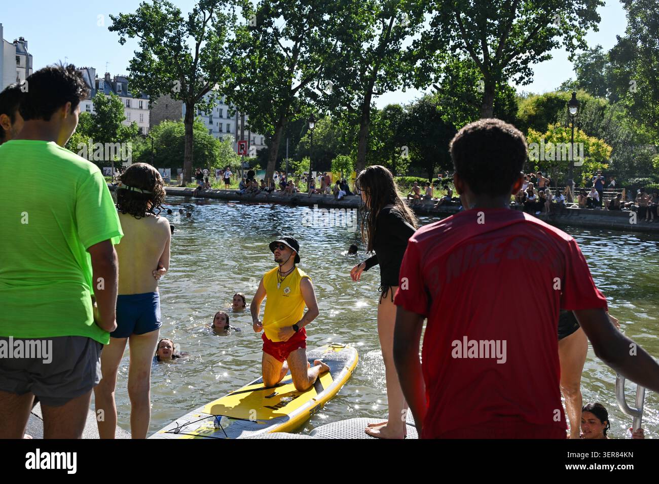 Parisians bath in the Canal Saint-Martin in Paris, on Wednesday, June ...