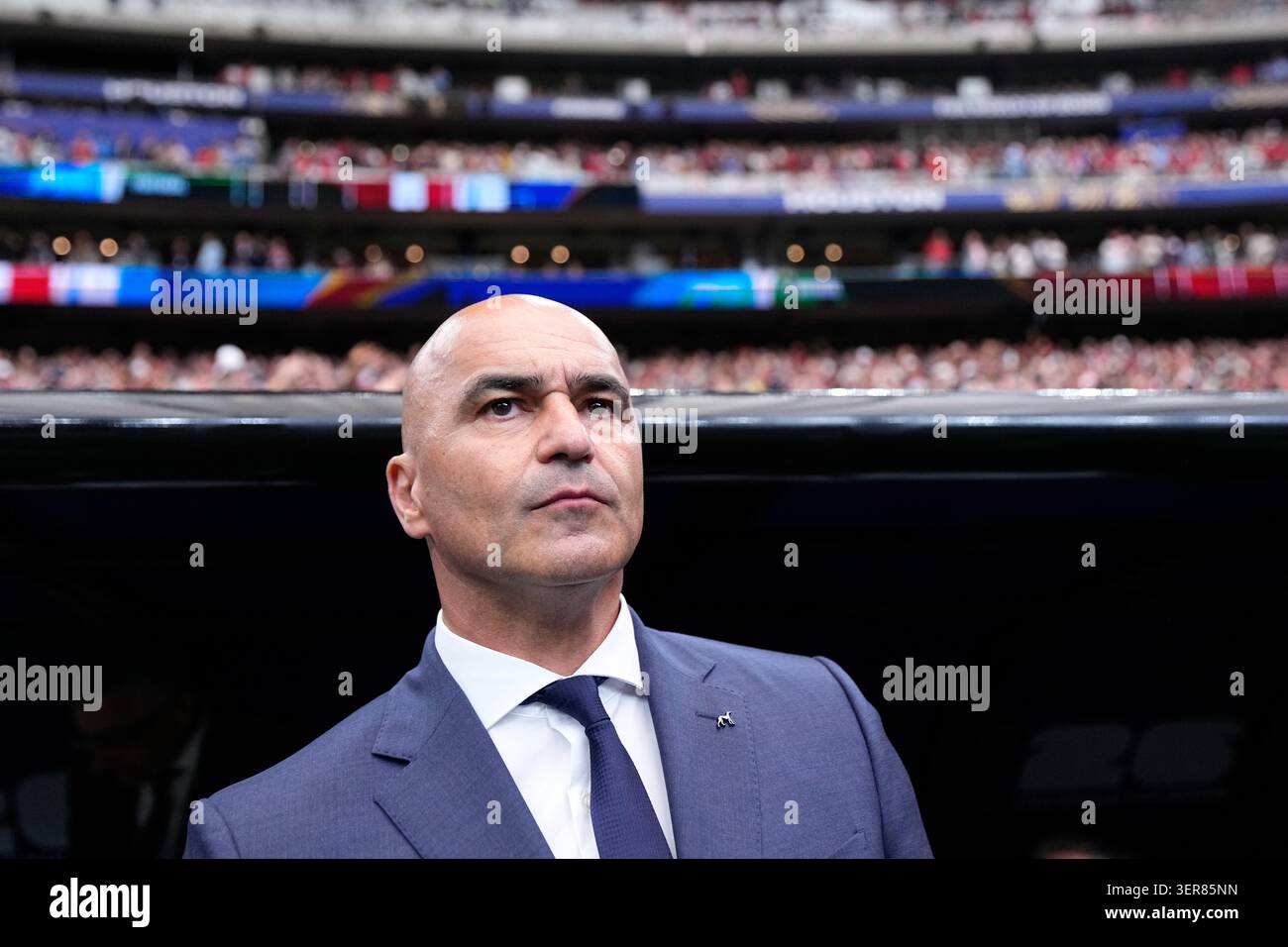 Portugal coach Roberto Martinez stands by the bench before the World ...