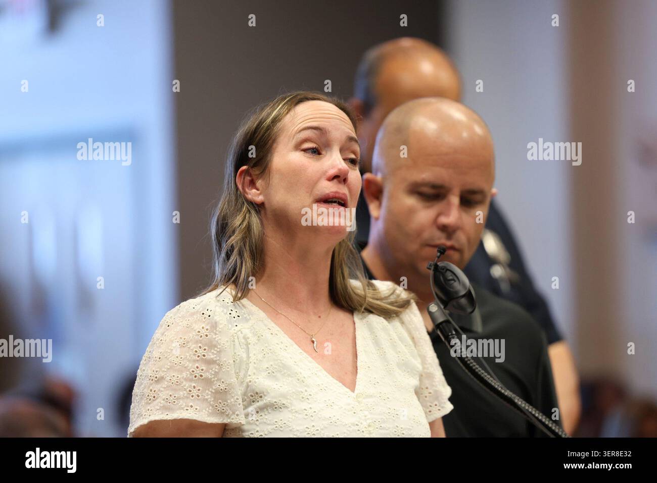 Melissa Cann, sister of Maureen Brainard Barnes, speaks prior to ...