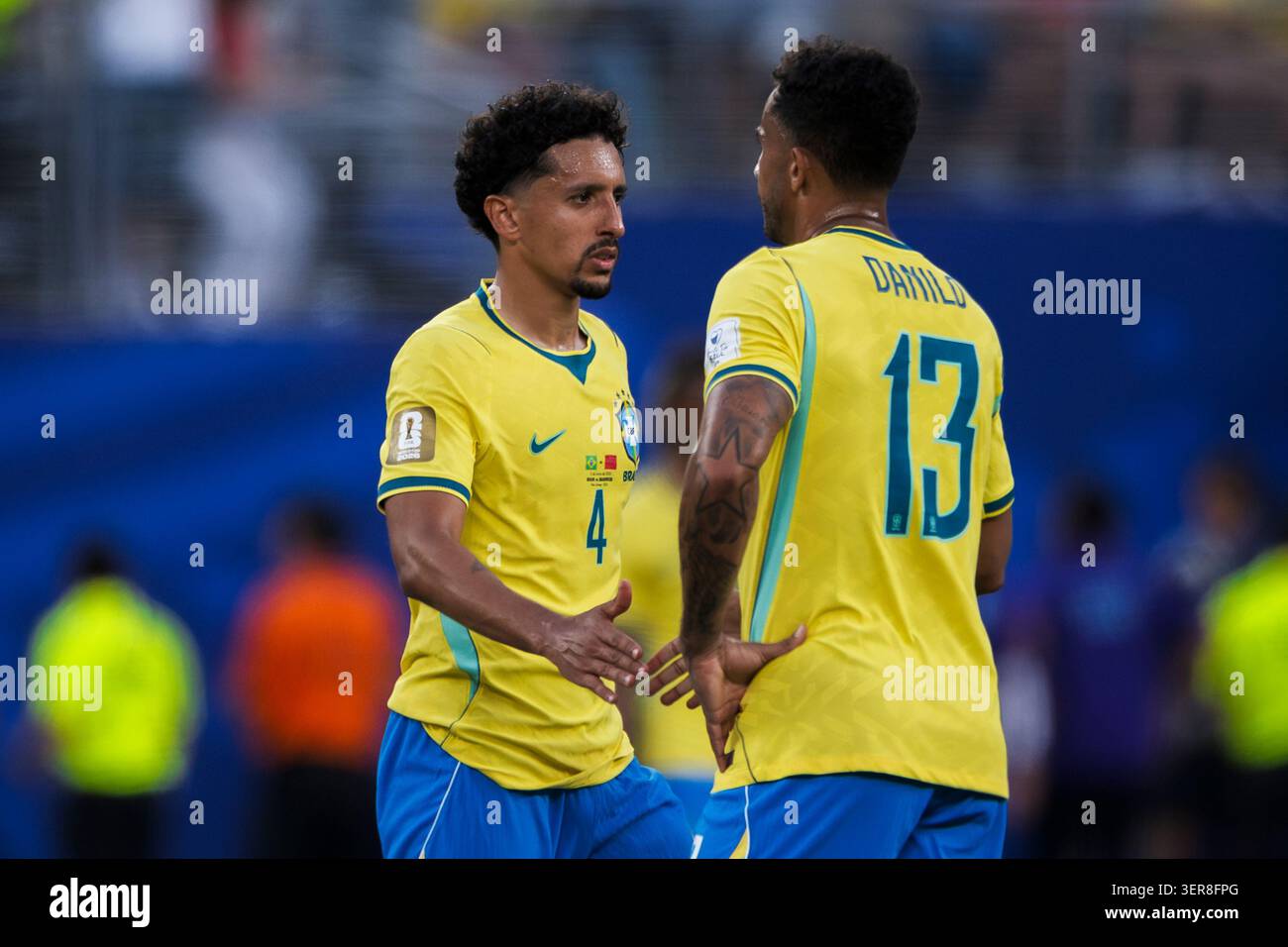 Marquinhos of Brazil shakes hands with Danilo of Brazil during the FIFA ...