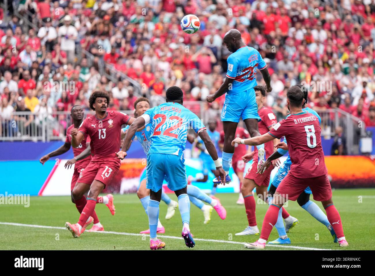 Congo's Yoane Wissa, top right, scores his side's first goal during the ...