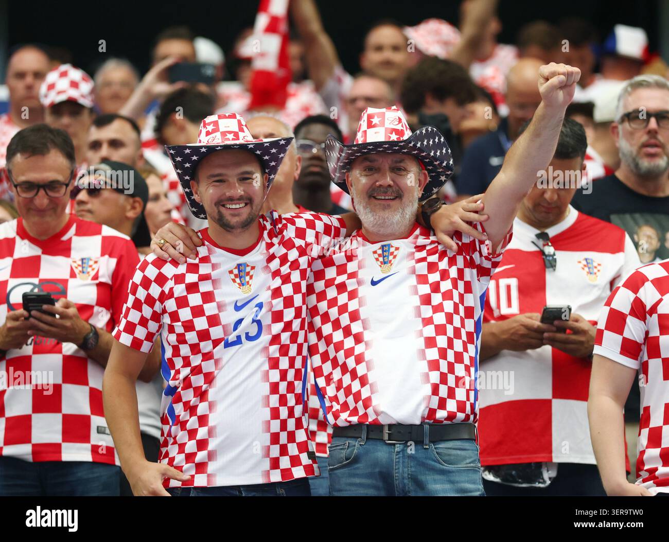 Supporters of Team Croatia wear the national colors before the start of ...