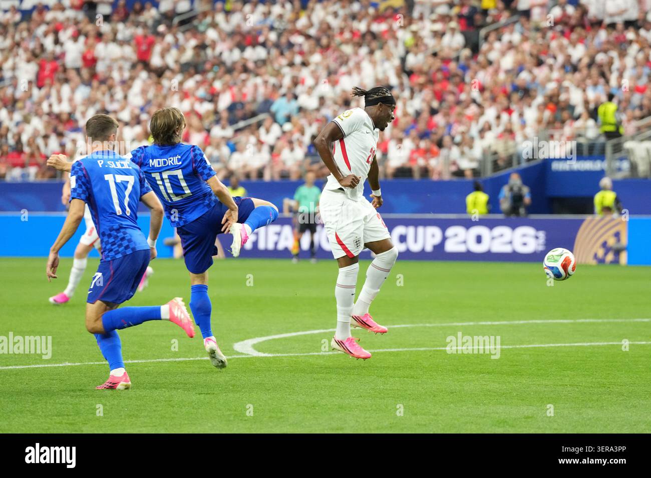 England's Noni Madueke (right) wins a penalty after being fouled by ...