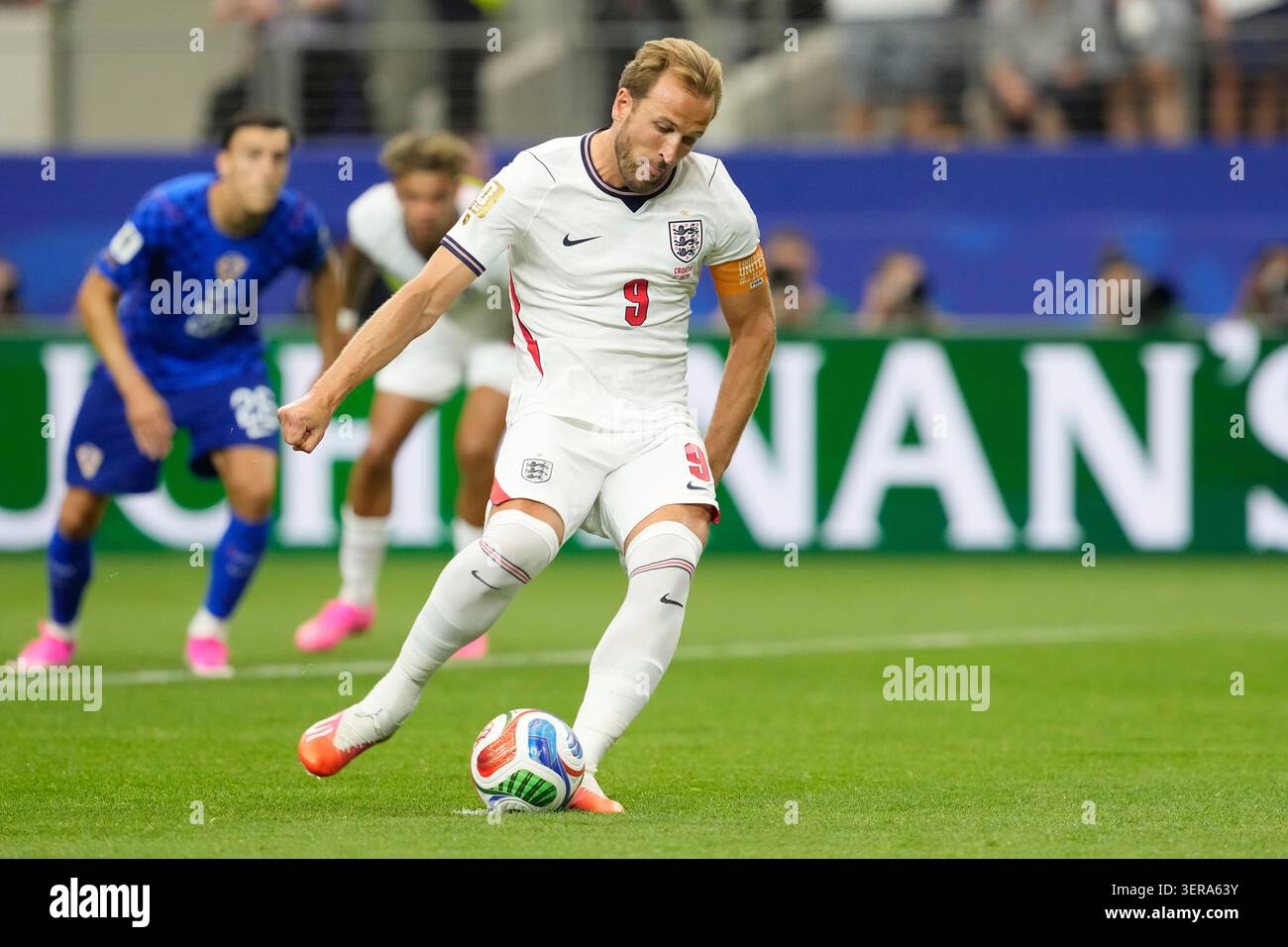 England's Harry Kane (9) scores his team's opening goal on a penalty ...
