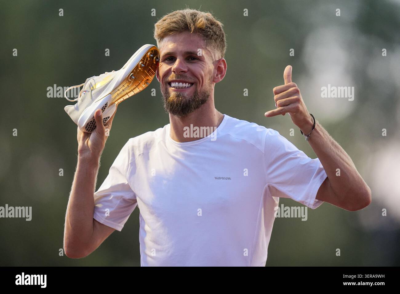Jimmy GRESSIER of France poses with his shoe during the Meeting of ...