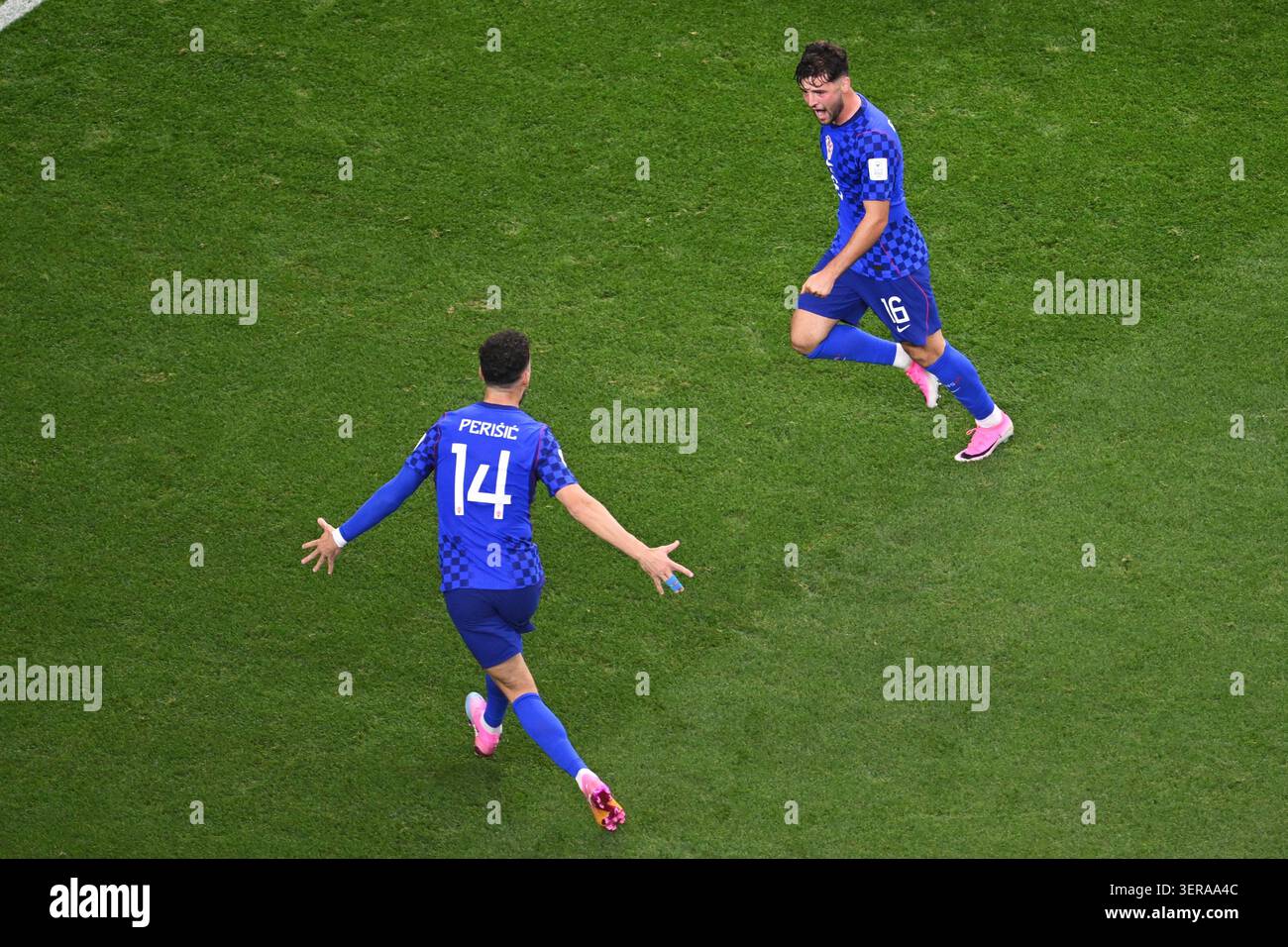 Croatia's Martin Baturina (16), right, celebrates after scoring his ...