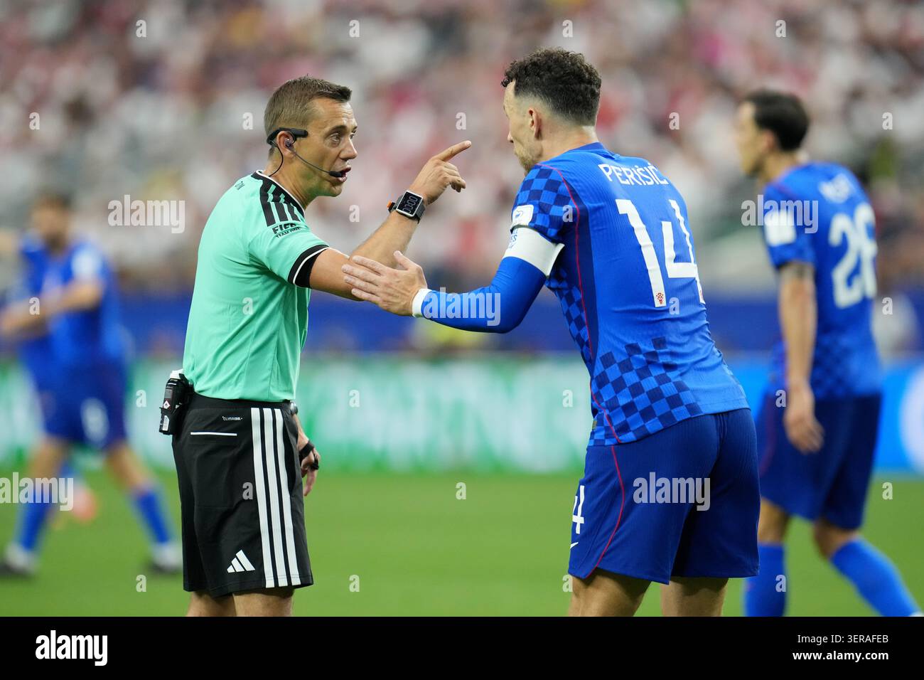 Croatia's Ivan Perisic remonstrates with Referee Clement Turpin (left ...