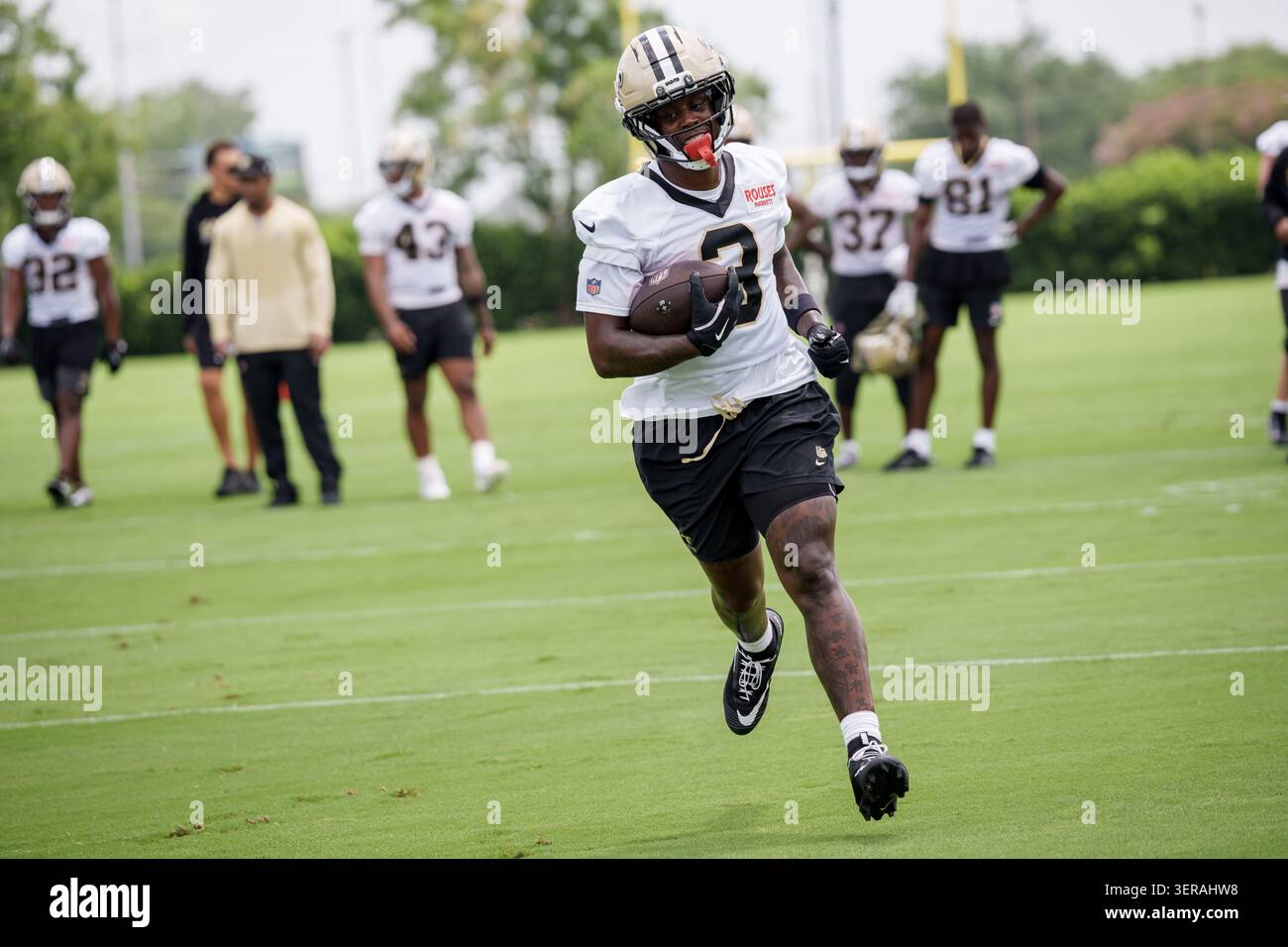 New Orleans Saints running back Travis Etienne Jr. (3) runs during the ...