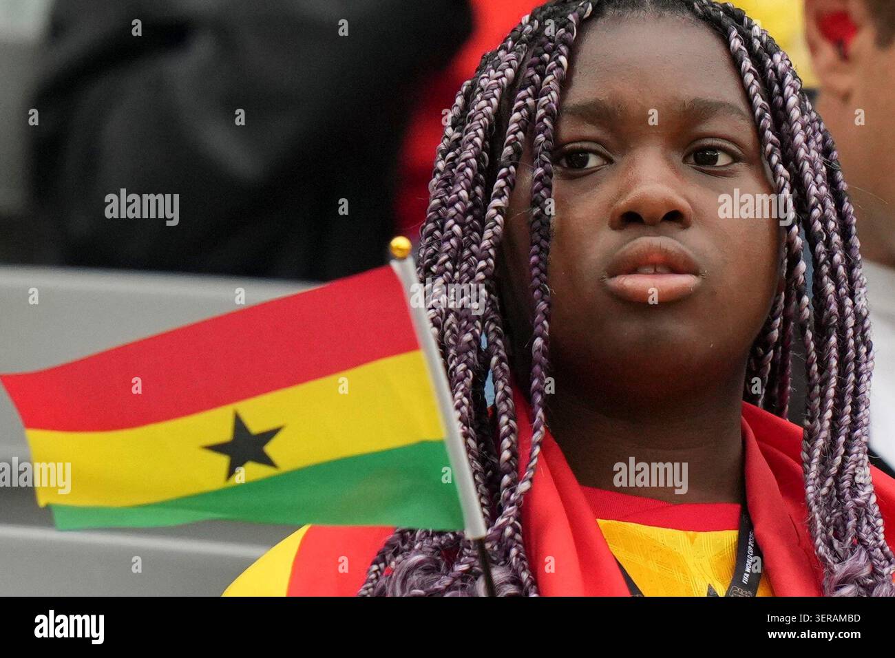 A fan of Ghana holds a national flag prior to the World Cup Group L ...