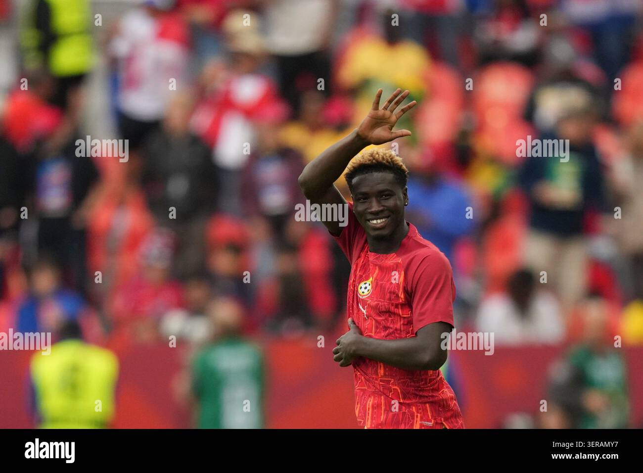 Ghana's Kojo Peprah Oppong waves to fans ahead of the World Cup Group L ...