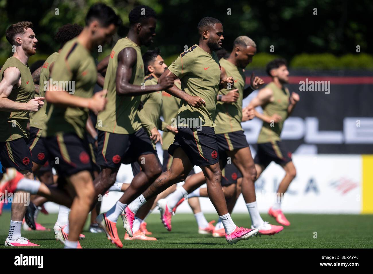 Canada's Cyle Larin runs with his teammates during a FIFA World Cup ...