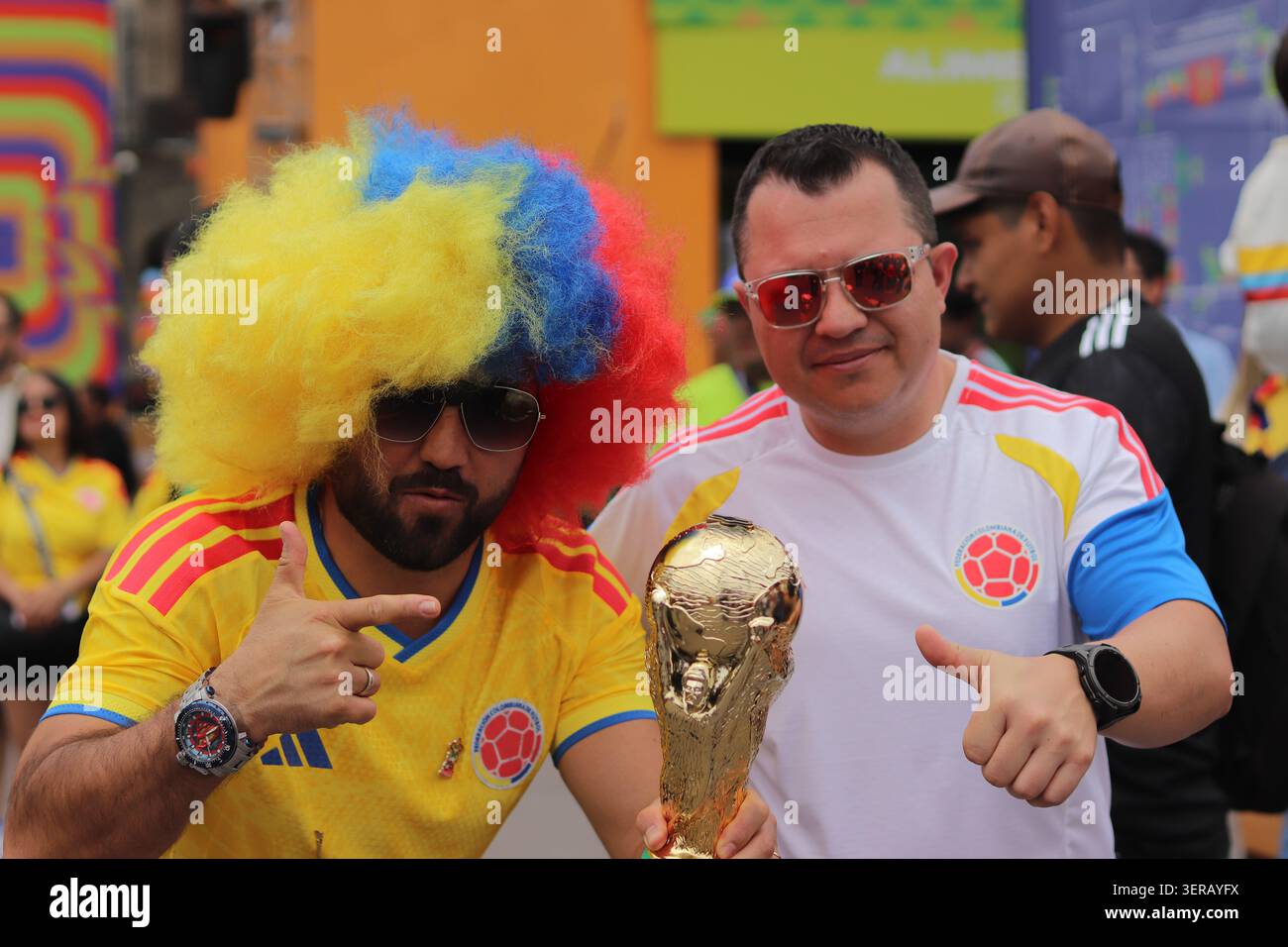 A Fan of Colombia nation team shows a FIFA World Cup trophy as support ...