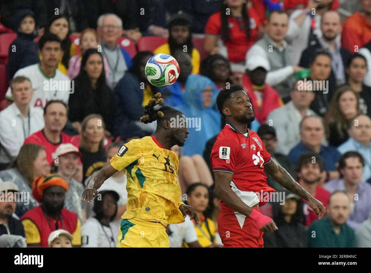 Ghana's Gideon Mensah, left, heads the ball against Panama's Amir ...