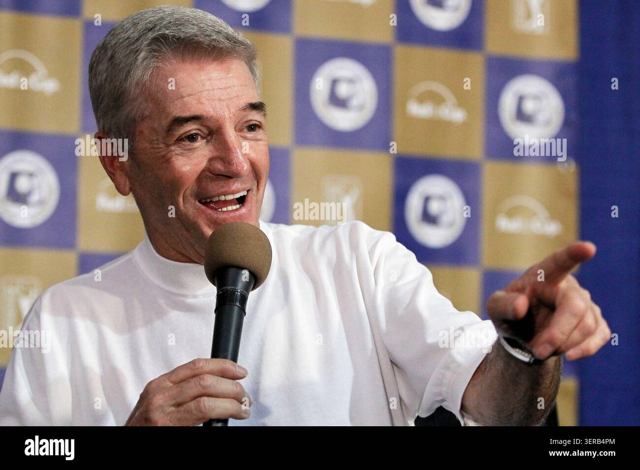 FILE - Comedian Tom Dreesen talks to the media during a news conference ...