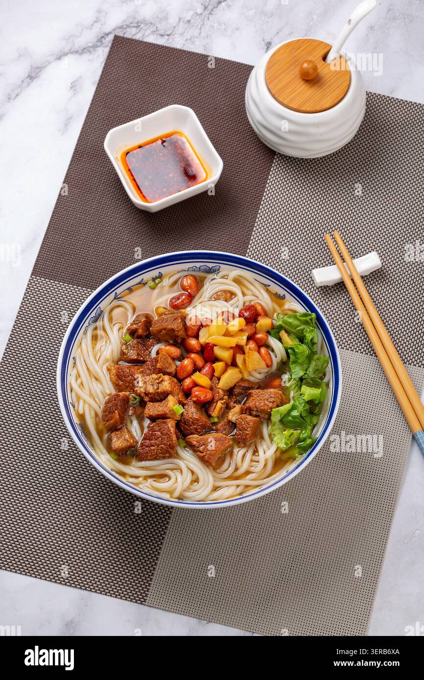 Chinese Braised Beef Noodle Soup with Green Vegetables. Traditional ...